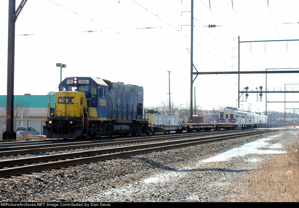 CSX GP15-1 1558 leads C964-03 with new Silverliner Vs